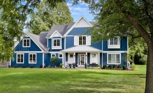 Modern Farmhouse with Blue Exterior - Home Bunch Interior Design Ideas